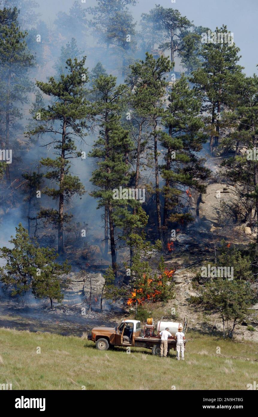 The Dahl fire south of Roundup, Mont. burns a hillside Wednesday June ...