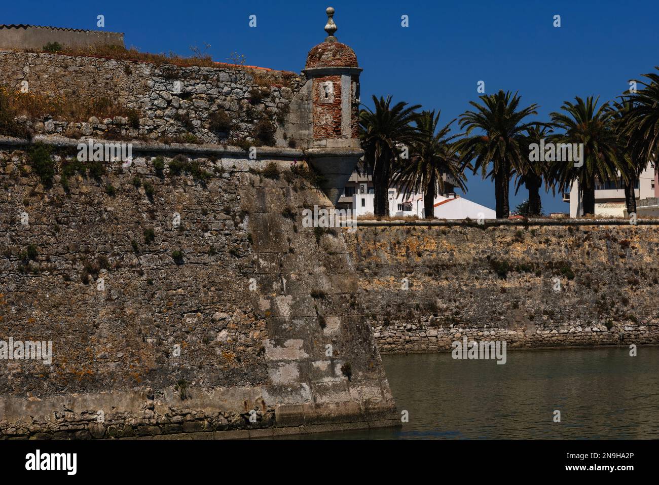 Venerable domed brick bartizan or corner tower overlooking the sloping ...