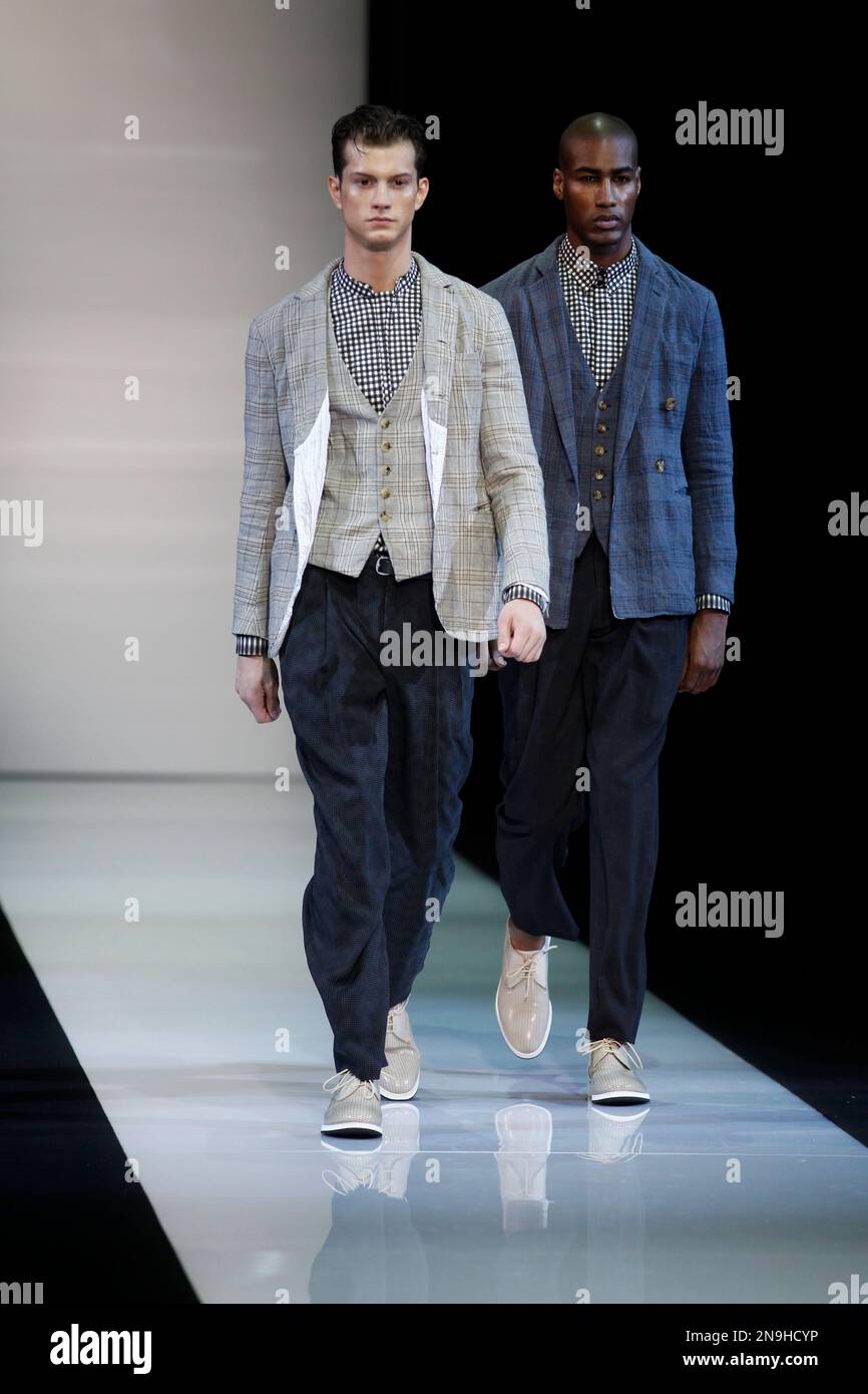 A model wears a creation of Giorgio Armani, from the men's Spring ...