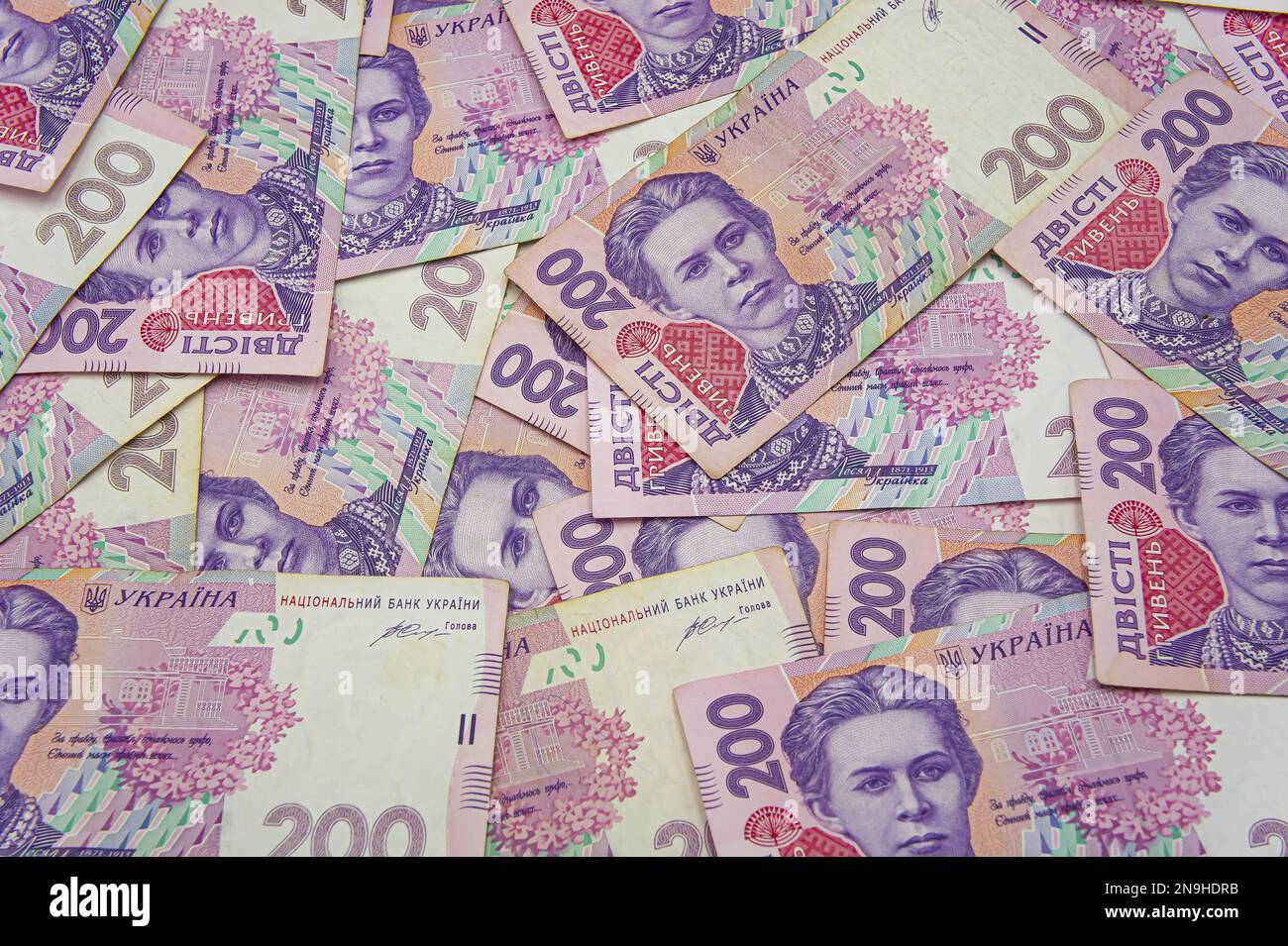 Ukrainian money background. banknotes with a face value of 200 hryvnia ...