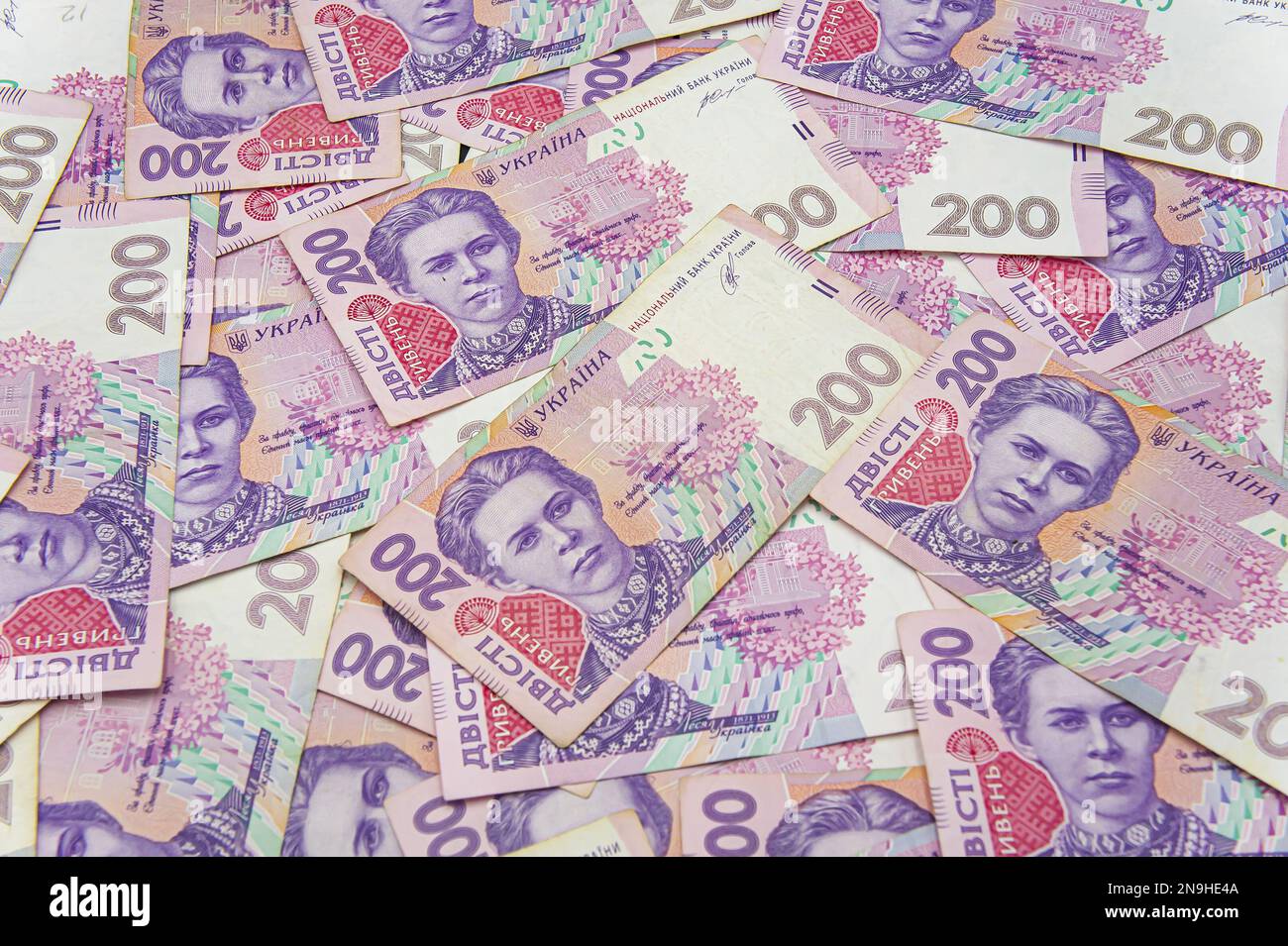Ukrainian money background. banknotes with a face value of 200 hryvnia ...