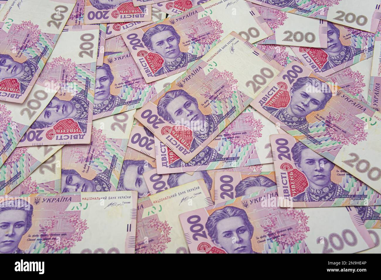 Ukrainian money background. banknotes with a face value of 200 hryvnia ...
