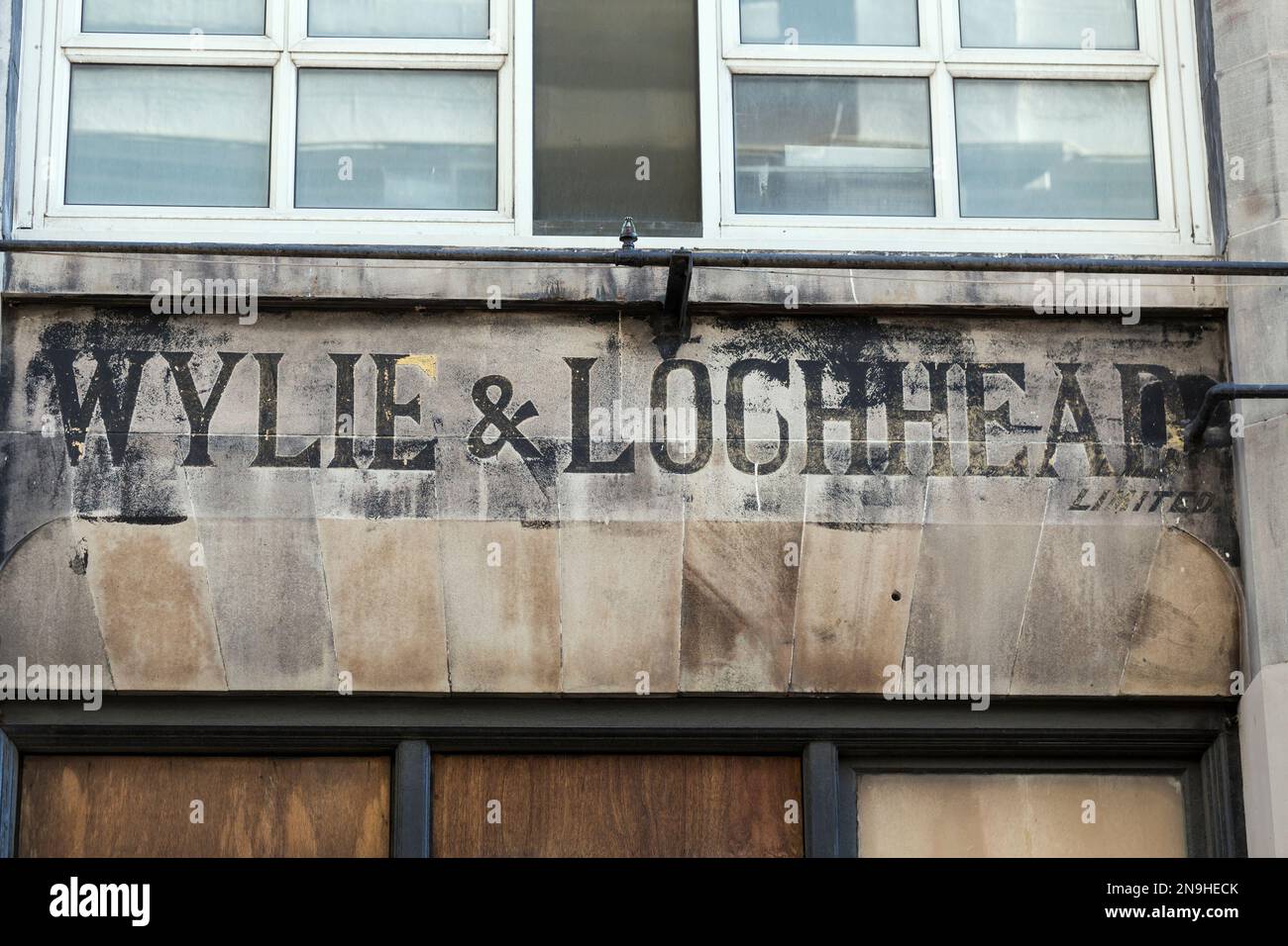 An old faded Wylie & Lochhead Limited sign, Glasgow, Scotland, UK ...