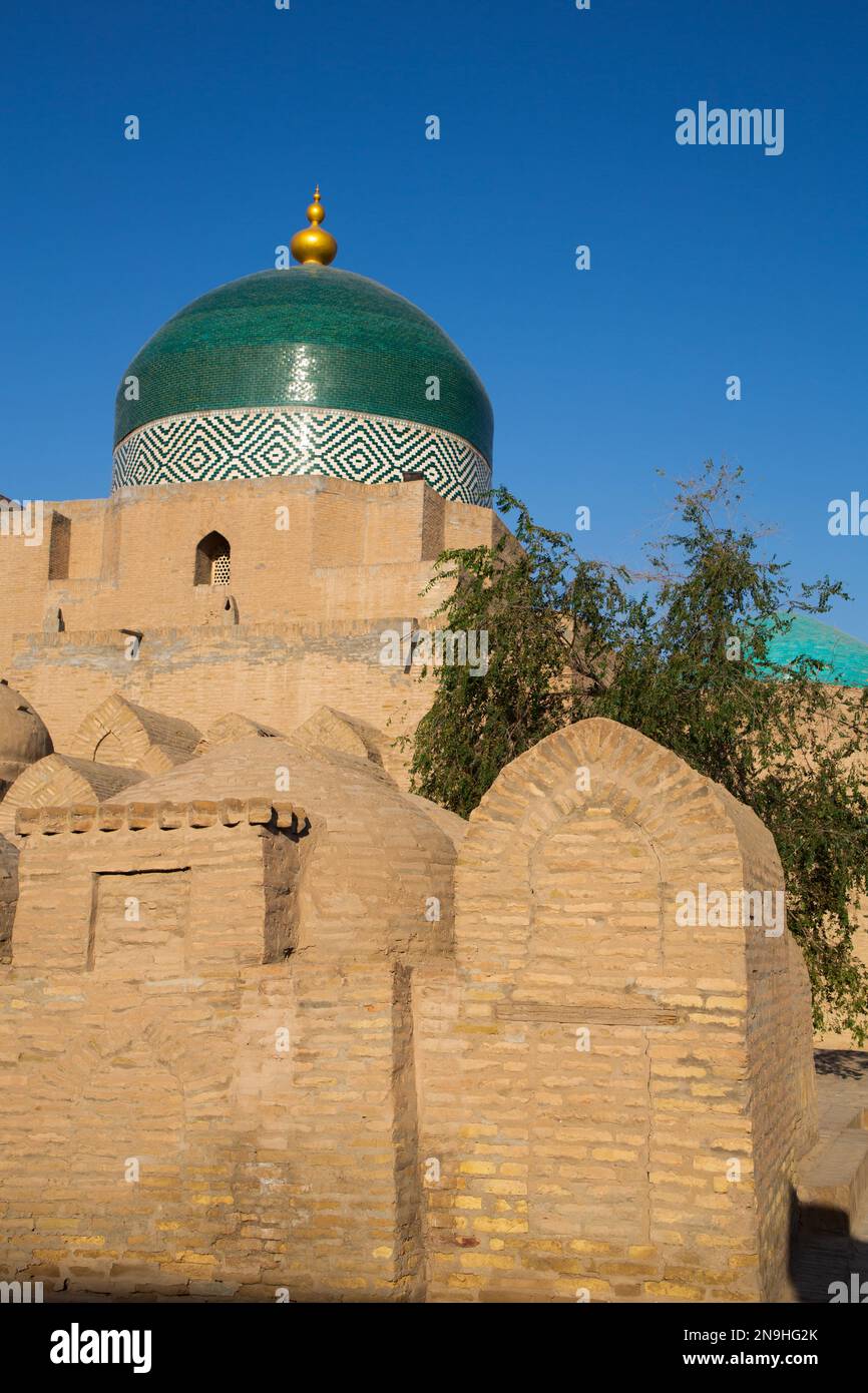 Tombs (foreground), Timurid-style Dome, Pakhlavon Mahmud Mausoleum ...
