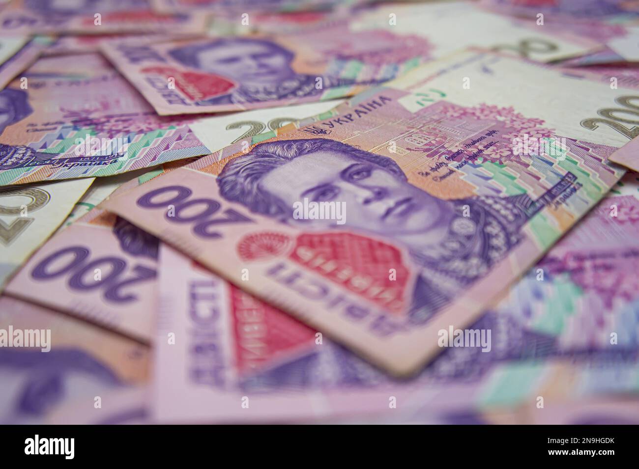 Ukrainian money background. banknotes with a face value of 200 hryvnia ...