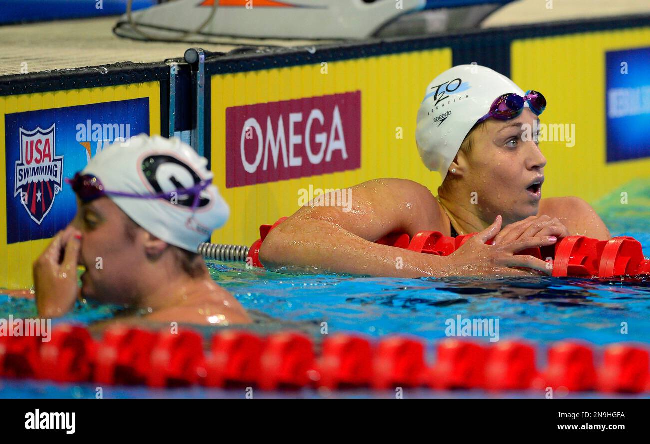 Katie Hoff checks the clock after swimming in the women's 400-meter ...