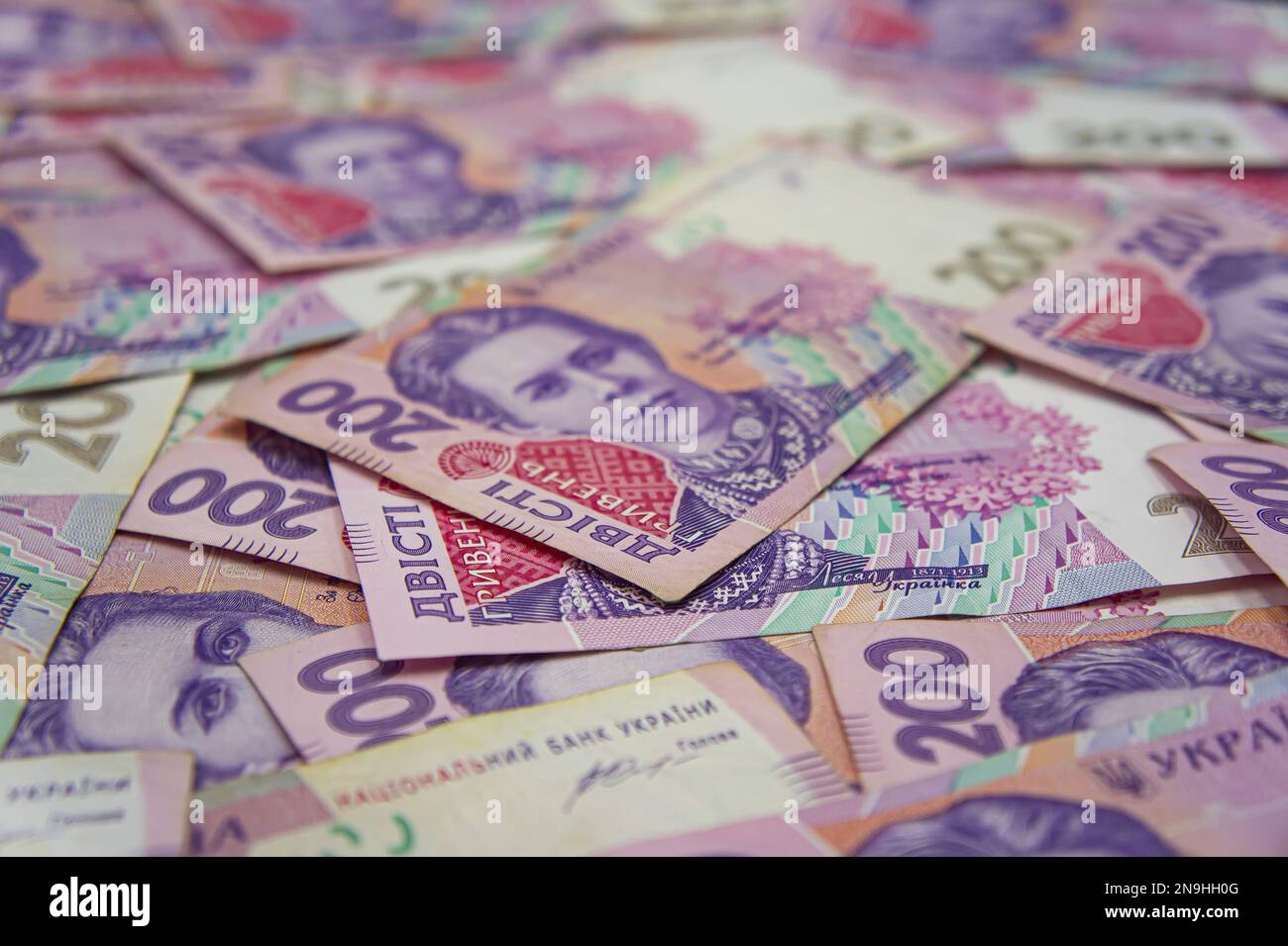 Ukrainian money background. banknotes with a face value of 200 hryvnia ...