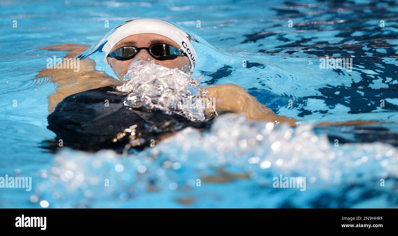 Natalie Coughlin swims in the women's 100-meter backstroke ...