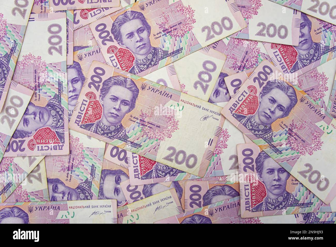 Ukrainian money background. banknotes with a face value of 200 hryvnia ...