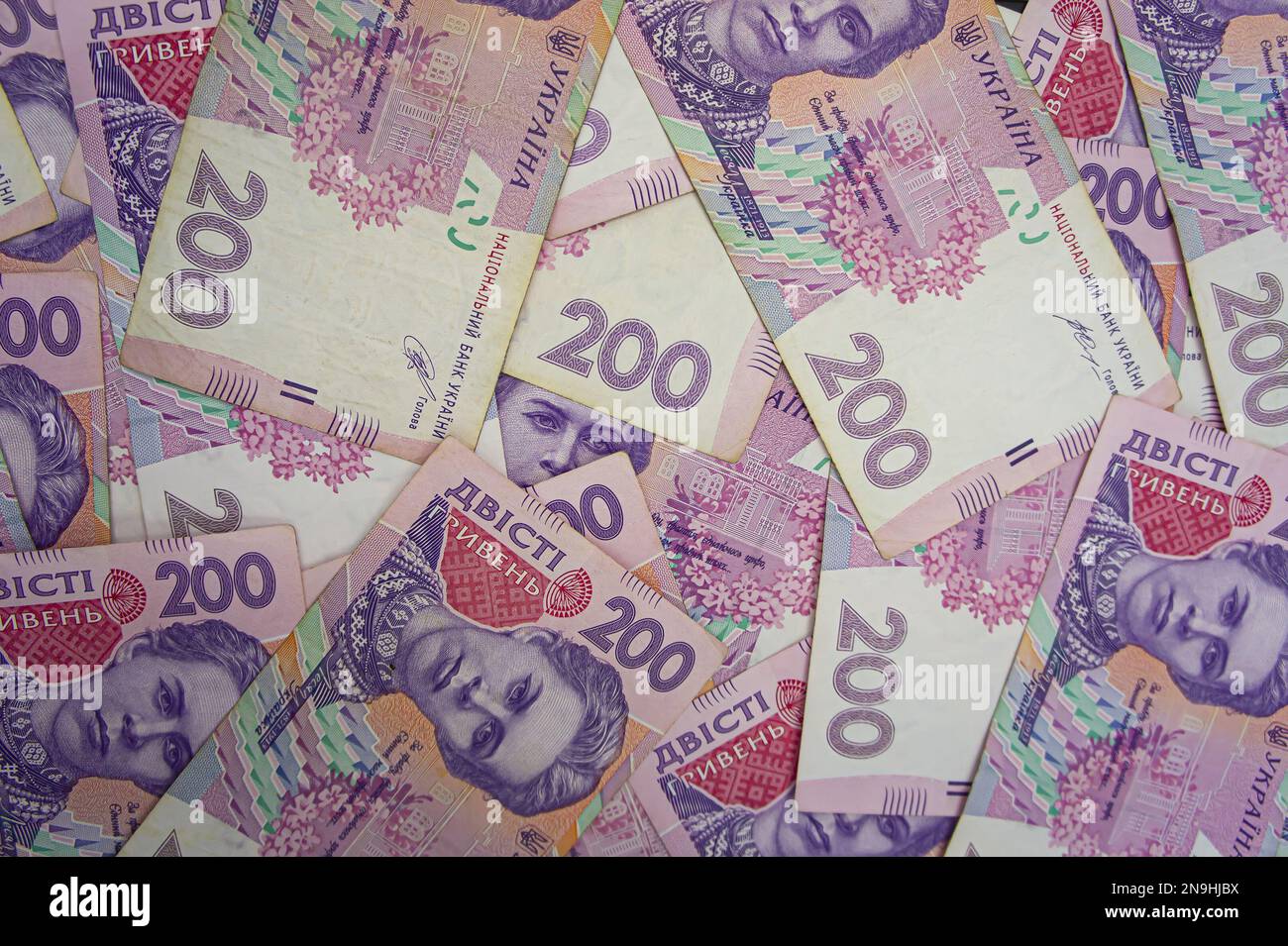 Ukrainian money background. banknotes with a face value of 200 hryvnia ...