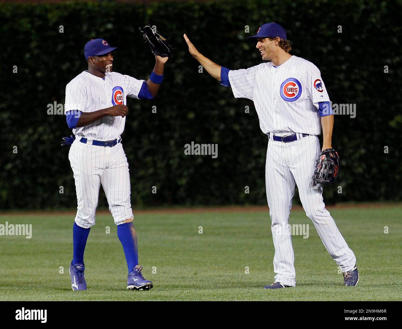 Chicago Cubs left fielder Alfonso Soriano, left, and center fielder Joe ...