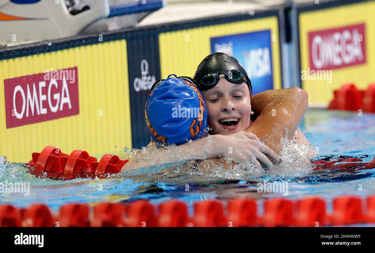 Elizabeth Beisel, left, and Cammile Adams talk after finishing in the ...