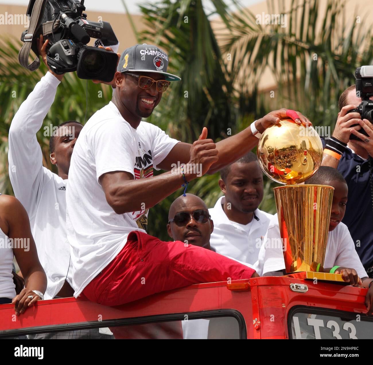 Miami Heat's Dwyane Wade holds the Larry O'Brien NBA Championship ...