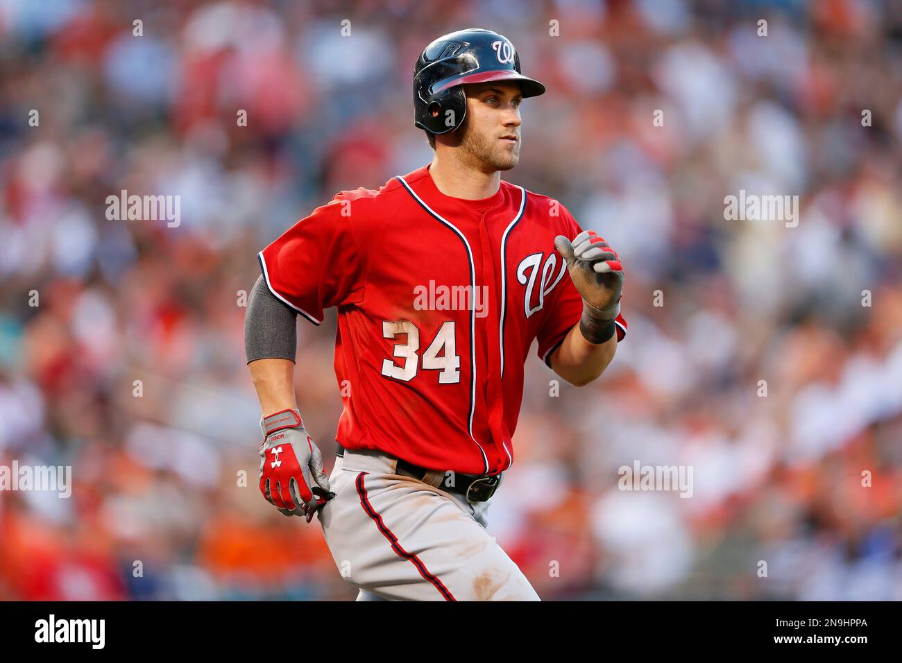 Washington Nationals' Bryce Harper jogs to first base duringan ...
