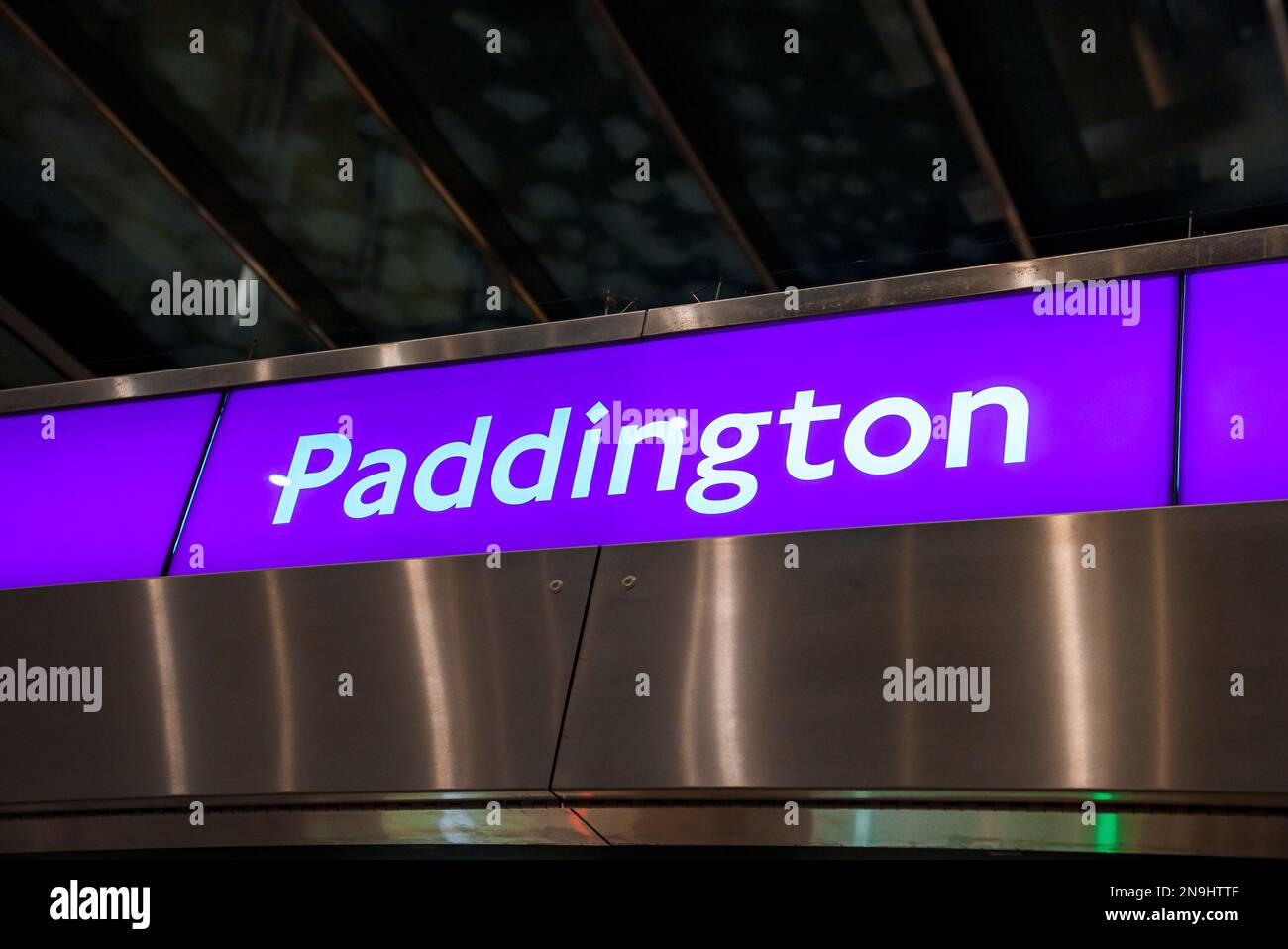 Paddington text on purple signboard in underground subway station at ...