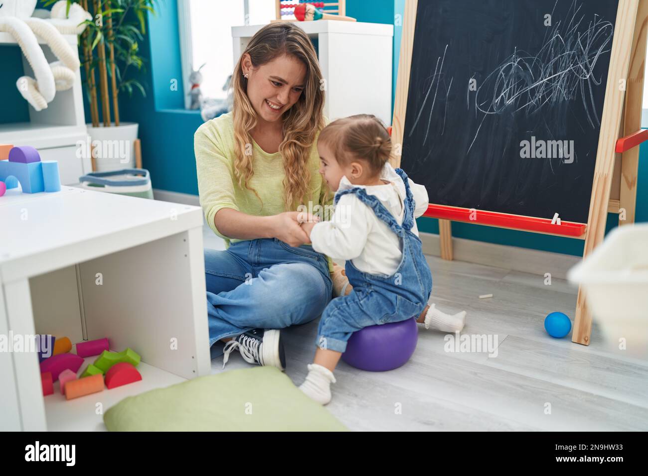 Child kindergarten adult hi-res stock photography and images - Alamy