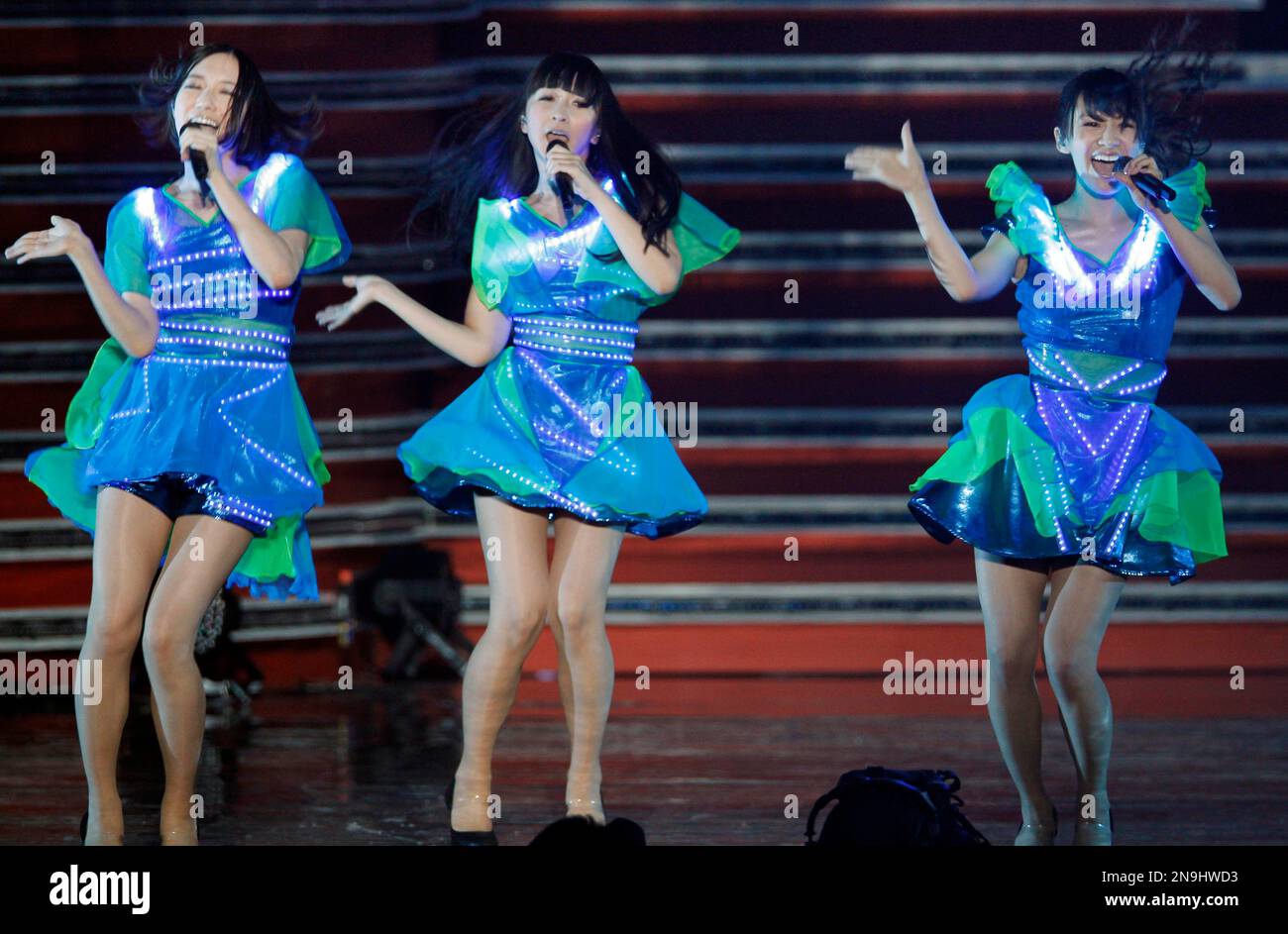 Perfume members Ayano Ohmoto, Yuka Kashino and Ayaka Nishiwaki, from ...