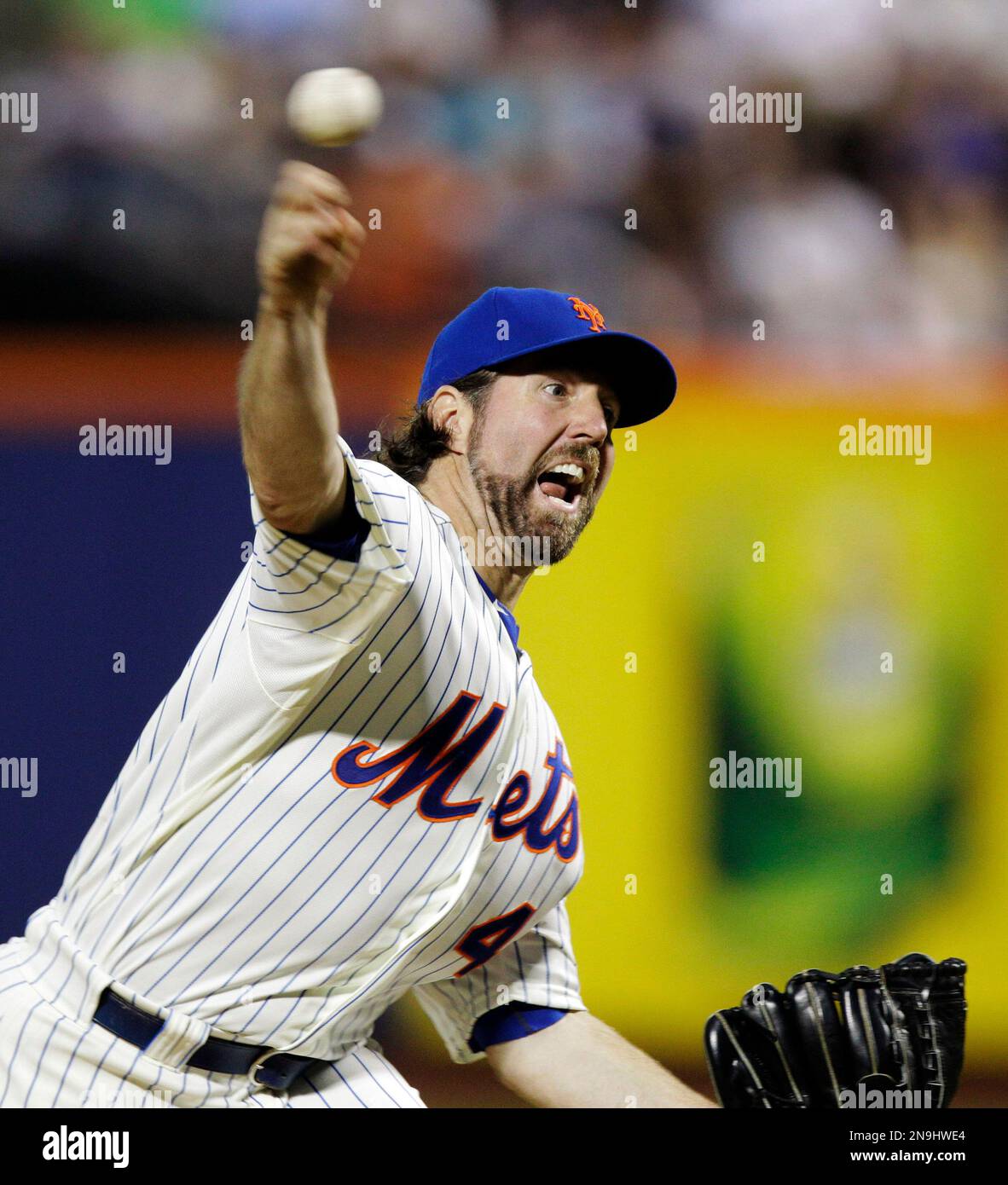 New York Mets starting pitcher R.A. Dickey (43) delivers in the first ...