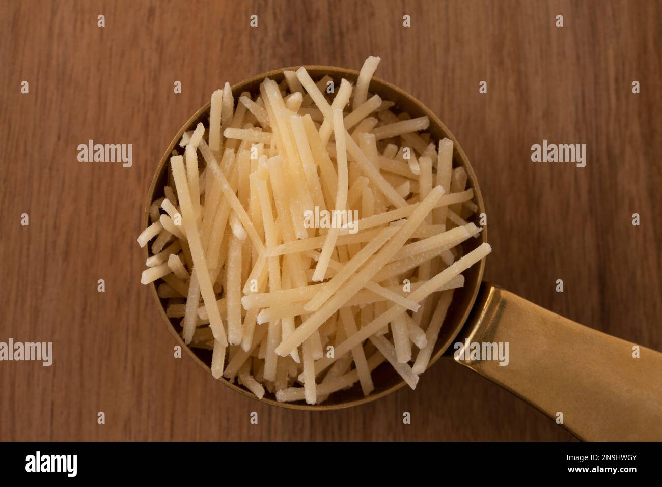 Shredded Parmesan Cheese in a Teaspoon Stock Photo - Alamy