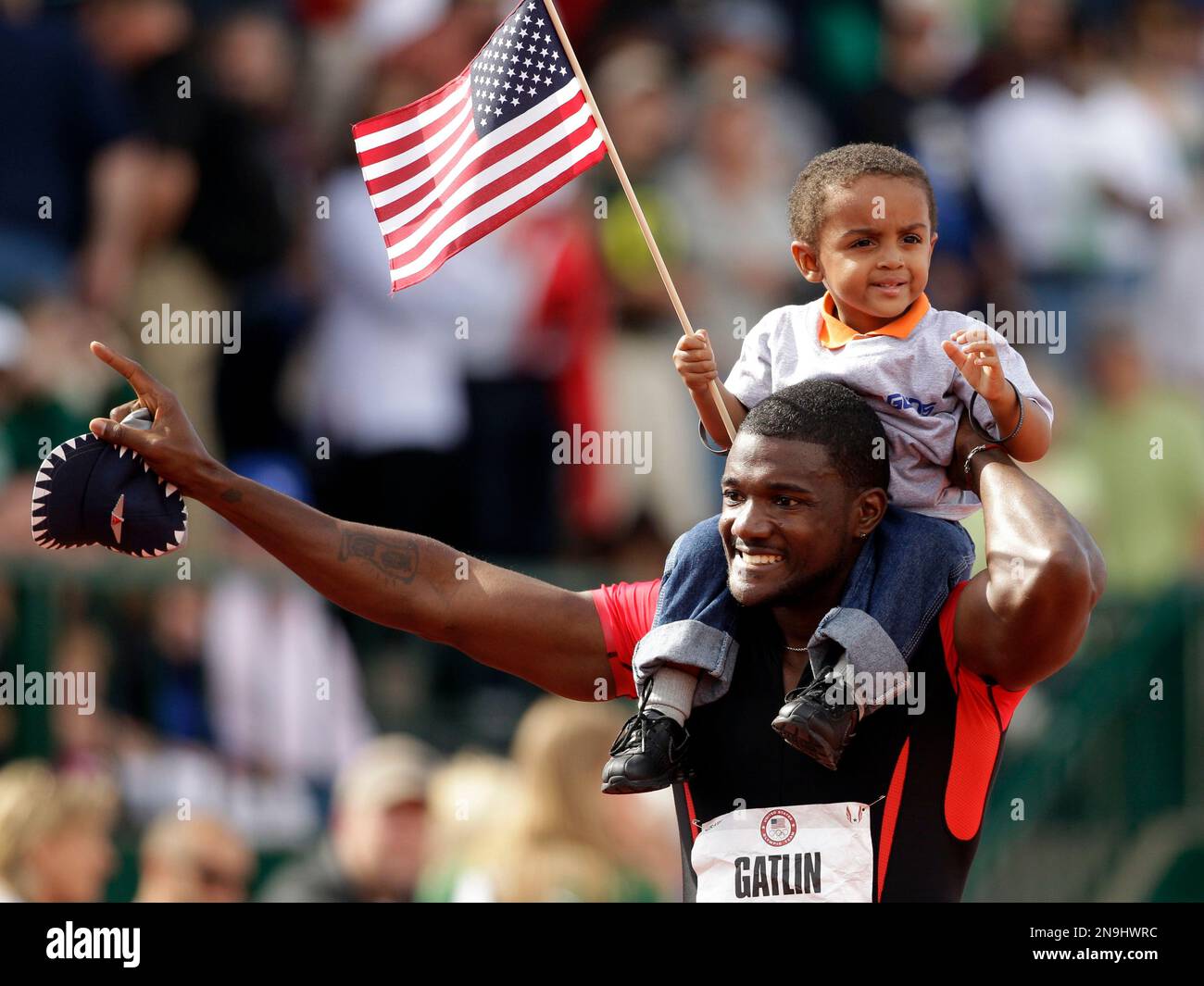 Justin Gatlin celebrates with his son Jace after winning the men's 100m ...
