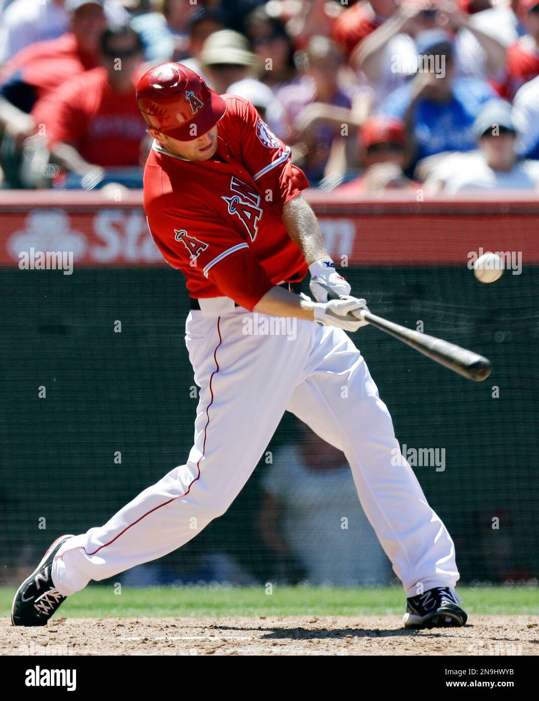 Los Angeles Angels' Mark Trumbo hits an RBI single against the Los ...
