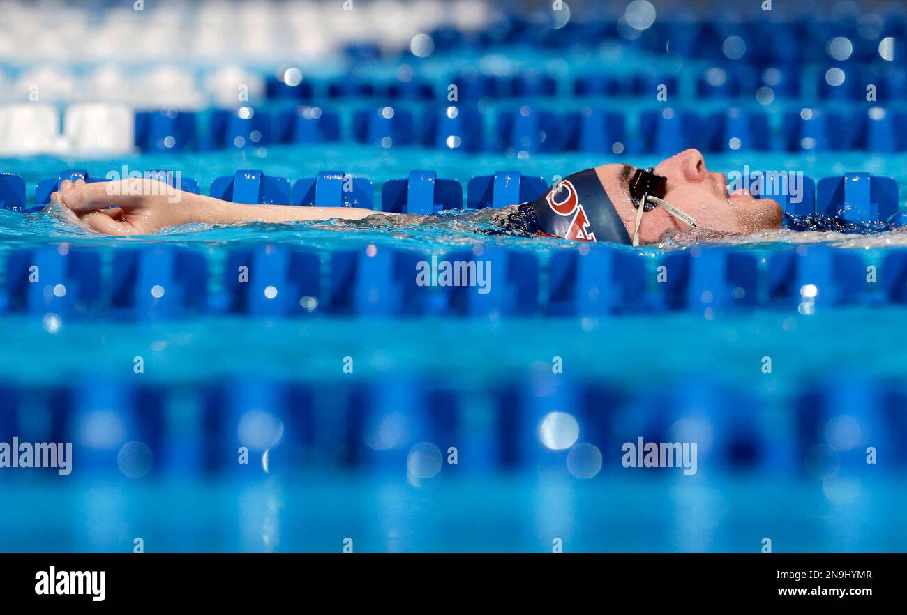 Conor Carlucci, of New York, floats between lanes during practice at ...