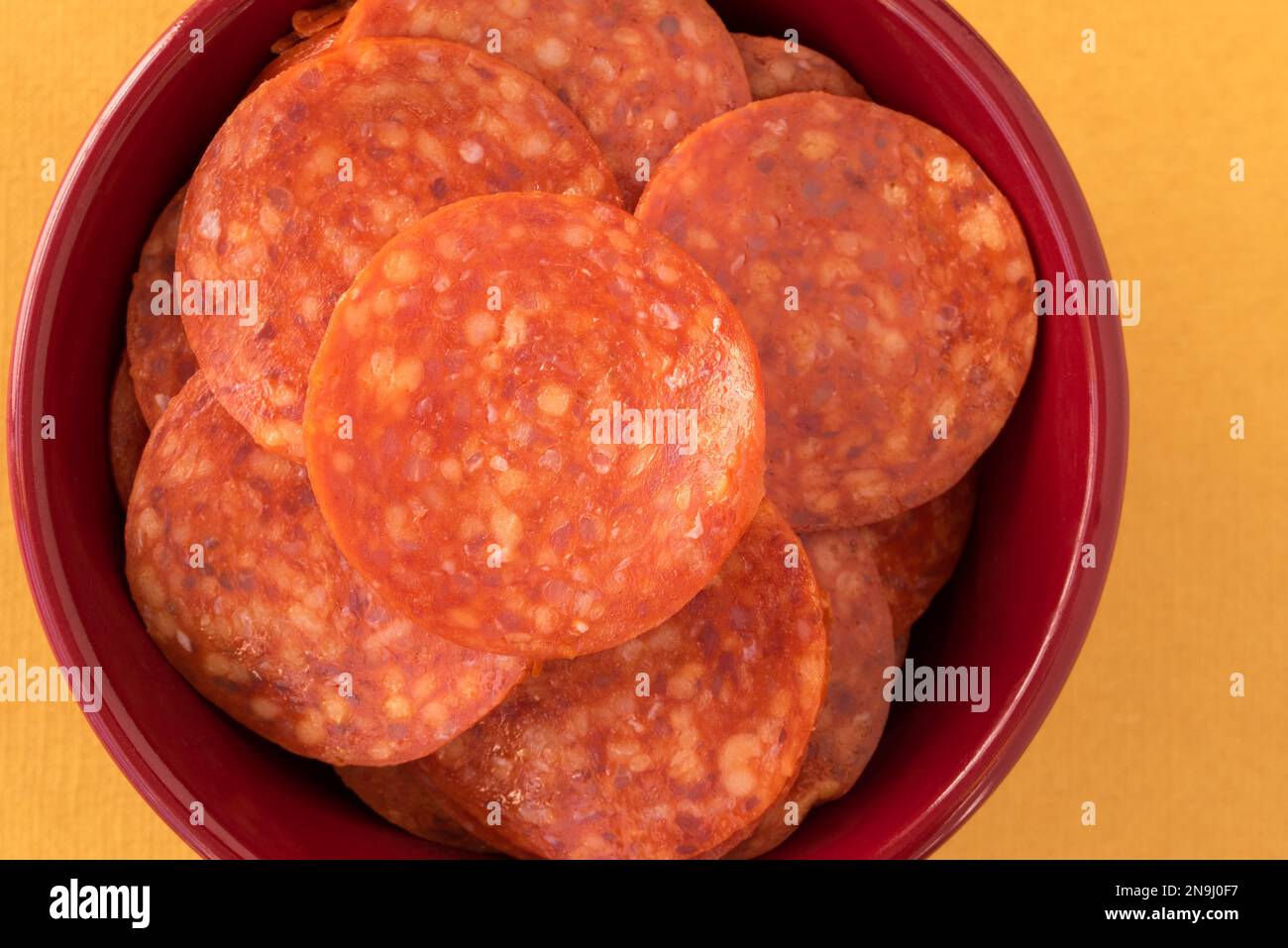 Pepperoni Slices in a Bowl Stock Photo - Alamy