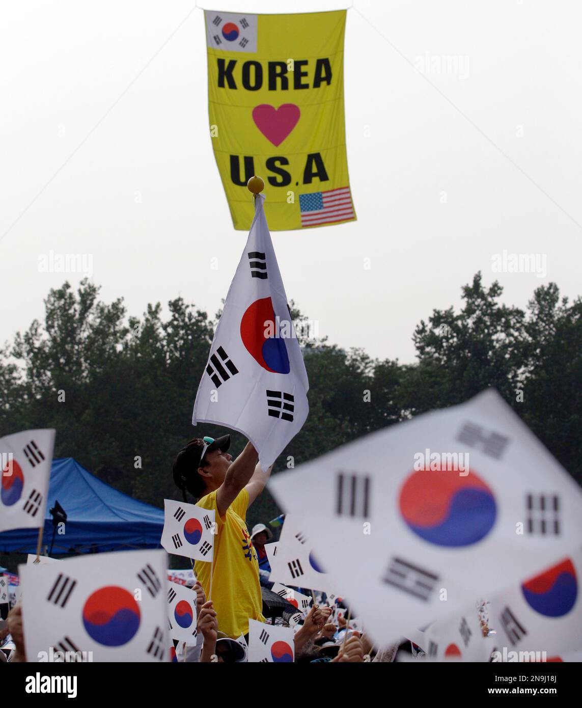 A South Korean Christians hold national flags during a mass rally in ...