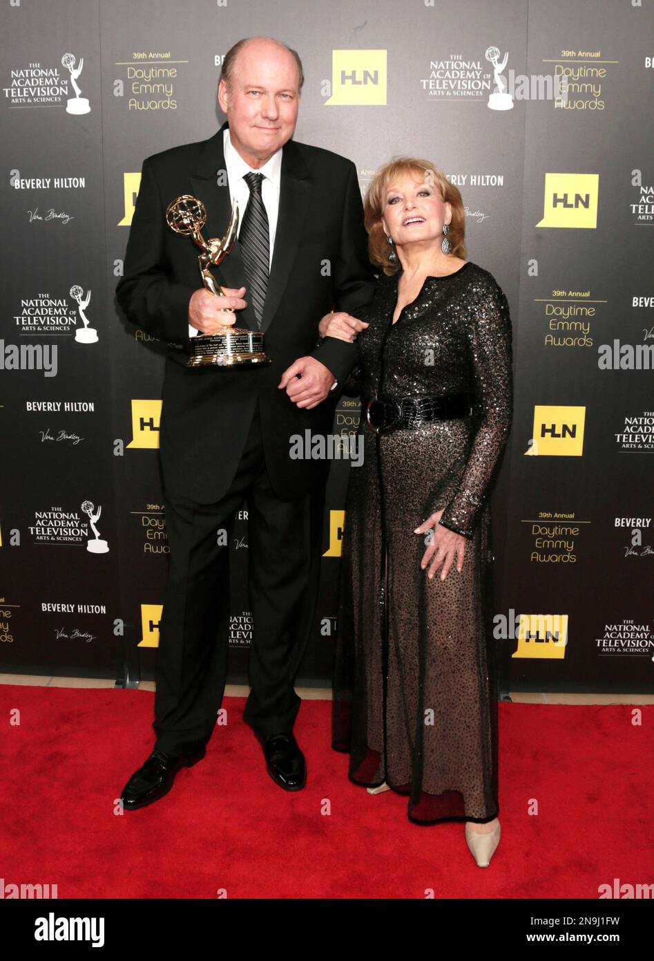 Bill Geddie, left, and Barbara Walters pose backstage with Geddie's ...