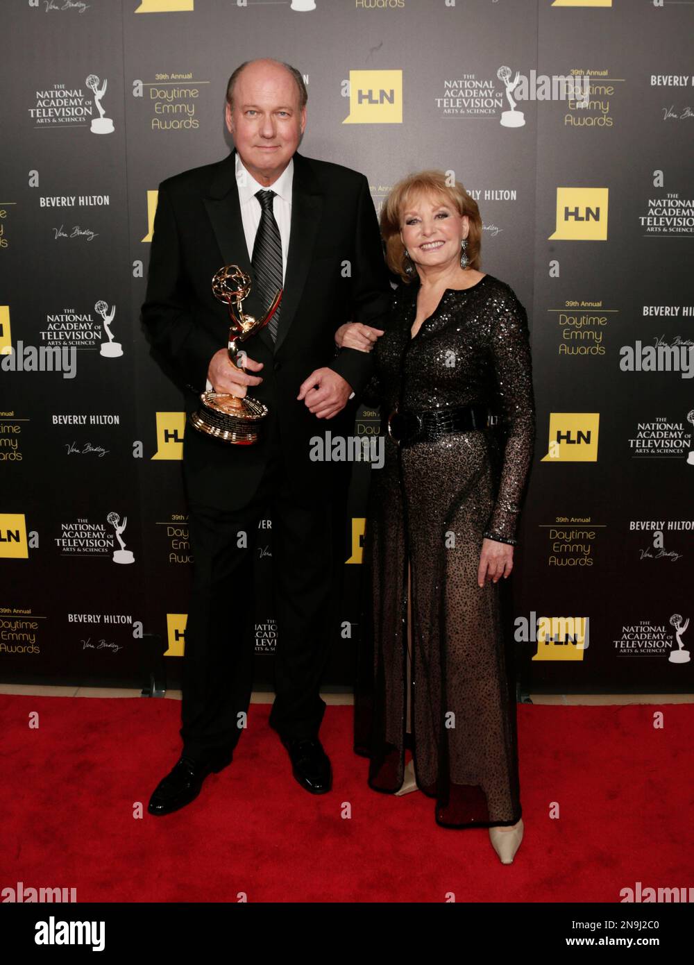 Bill Geddie, left, and Barbara Walters pose backstage with Geddie's ...
