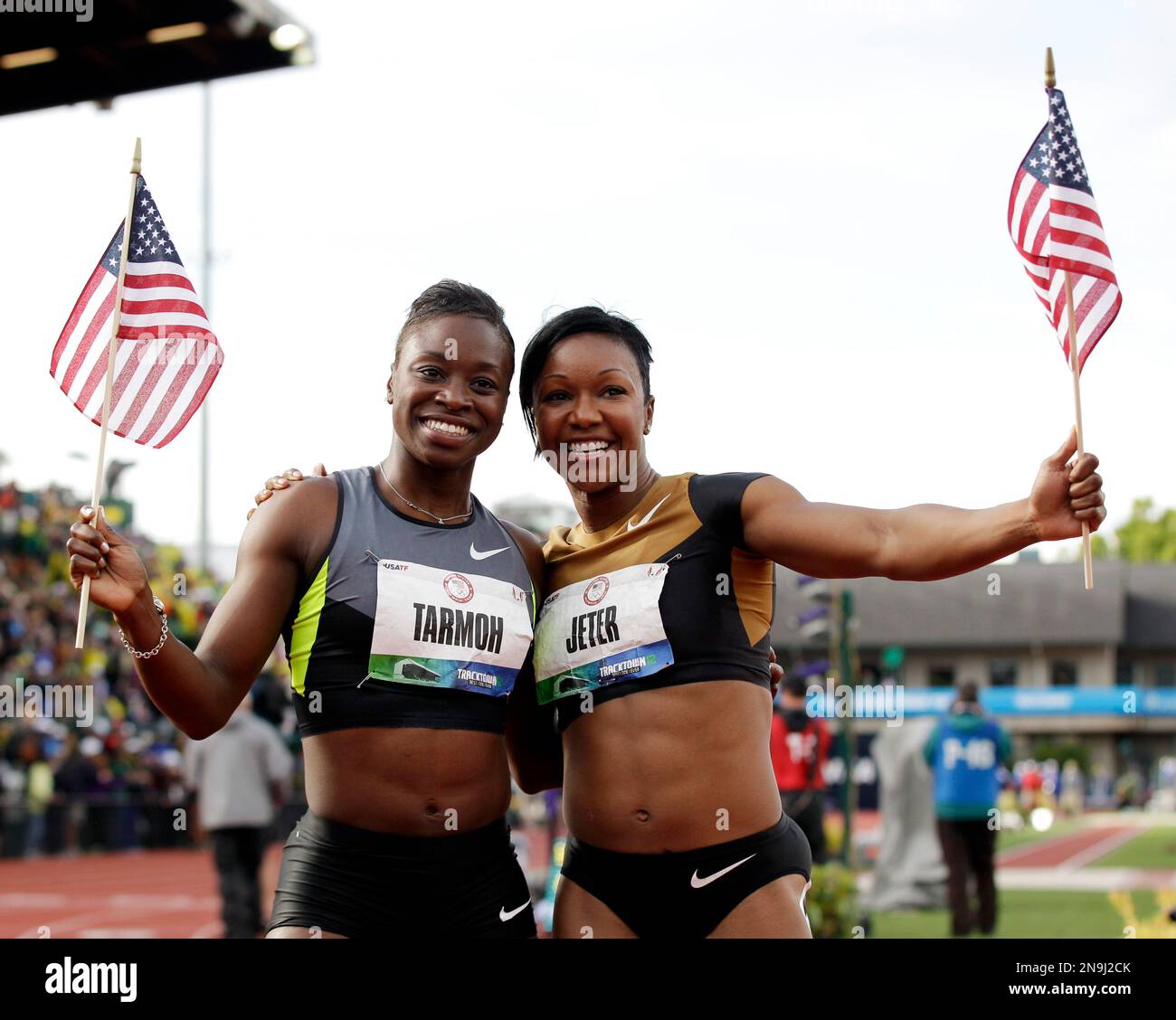 Carmelita Jeter and Jeneba Tarmoh celebrate after the women's 100m ...