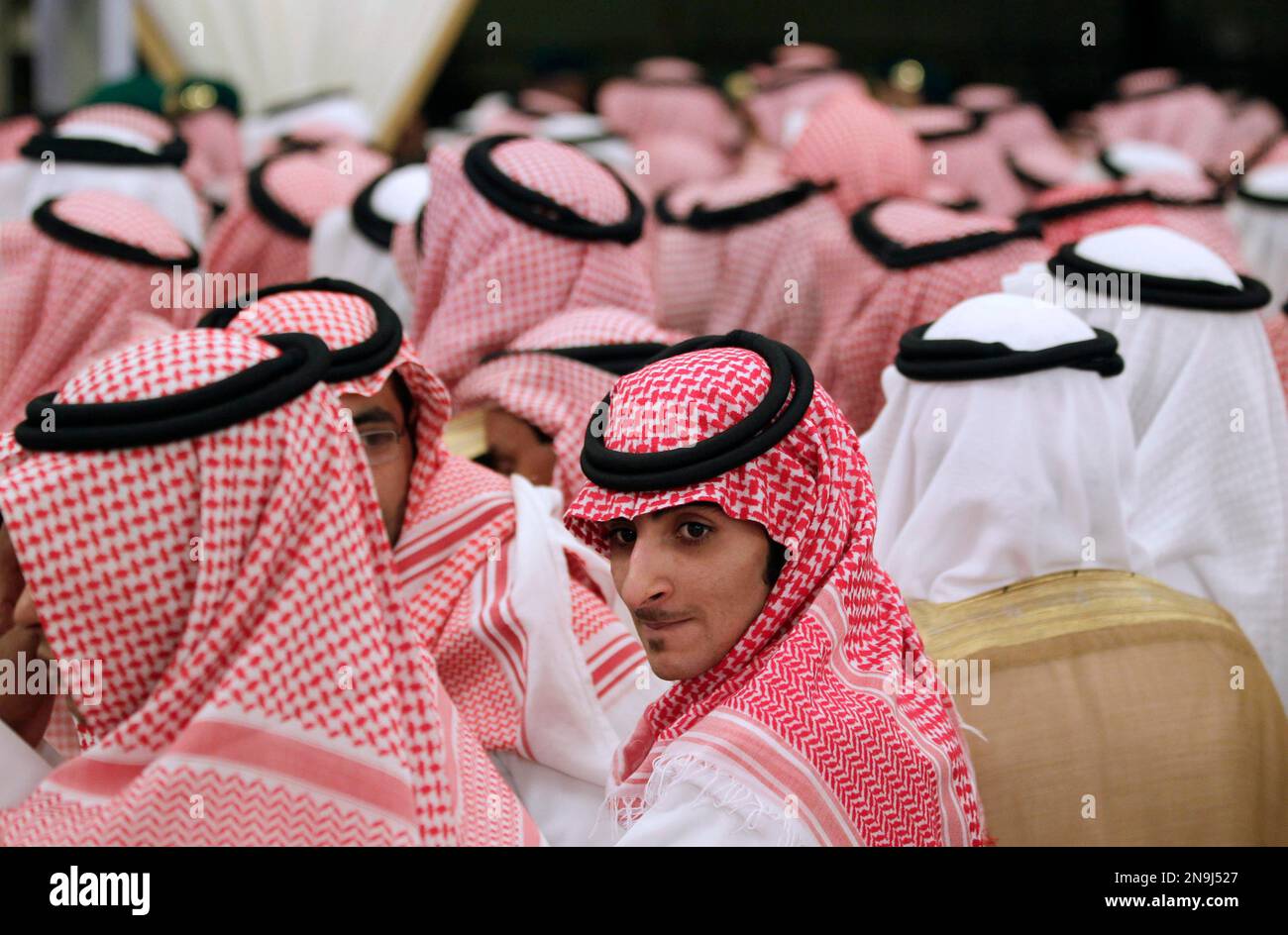 Saudi tribal chiefs crowd into a tent outside the royal palace in ...