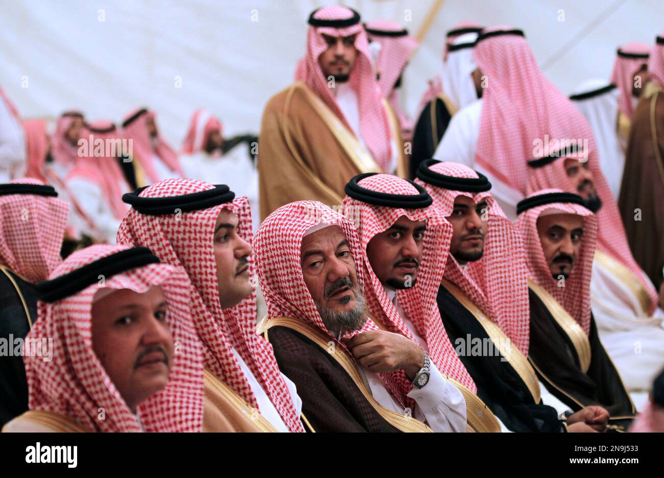 Saudi tribal chiefs crowd into a tent outside the royal palace in ...