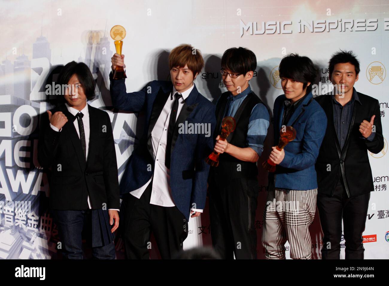 Taiwan rock band Mayday display their trophies for The Best Band at the ...