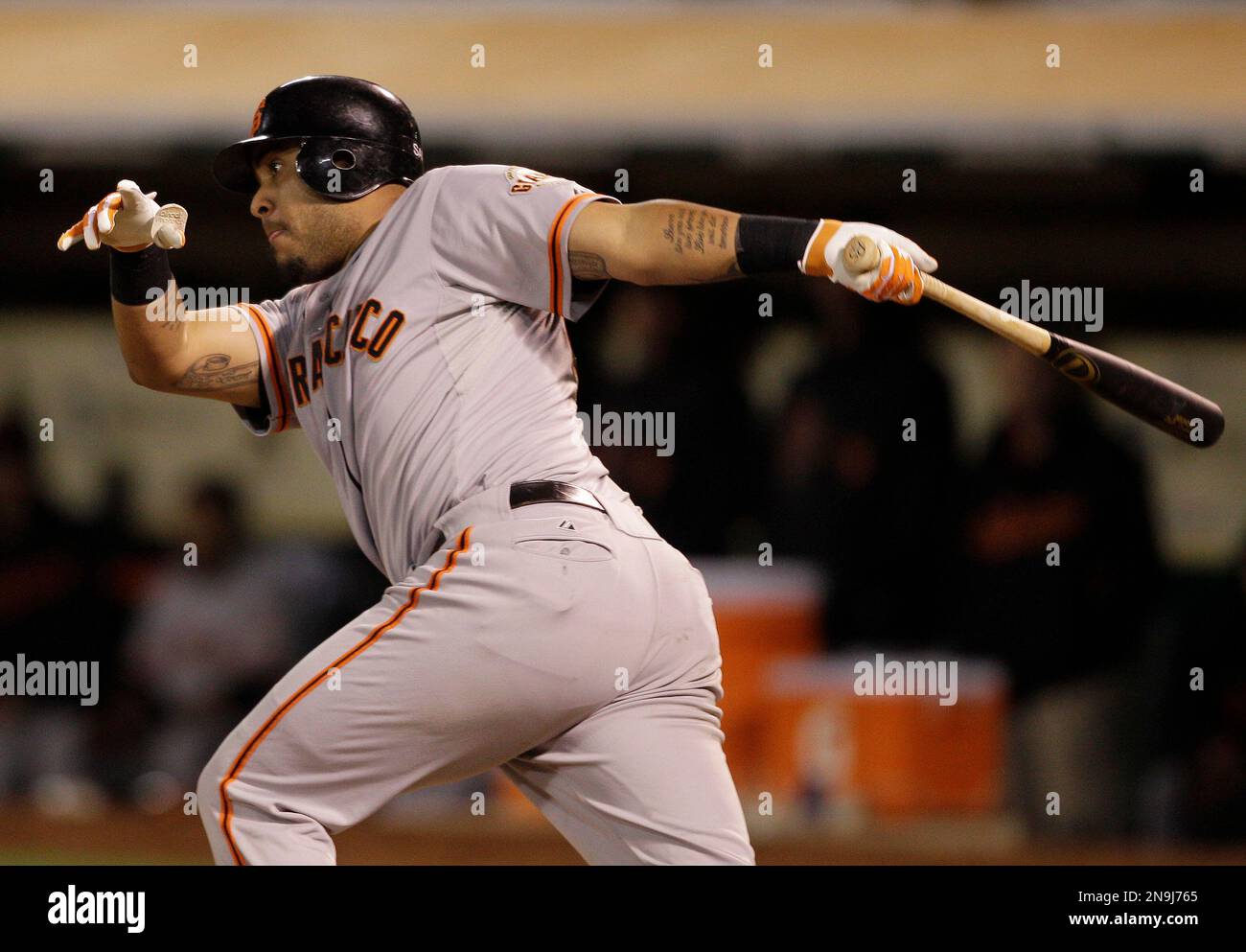 San Francisco Giants' Hector Sanchez hits an RBI single against the =ok ...