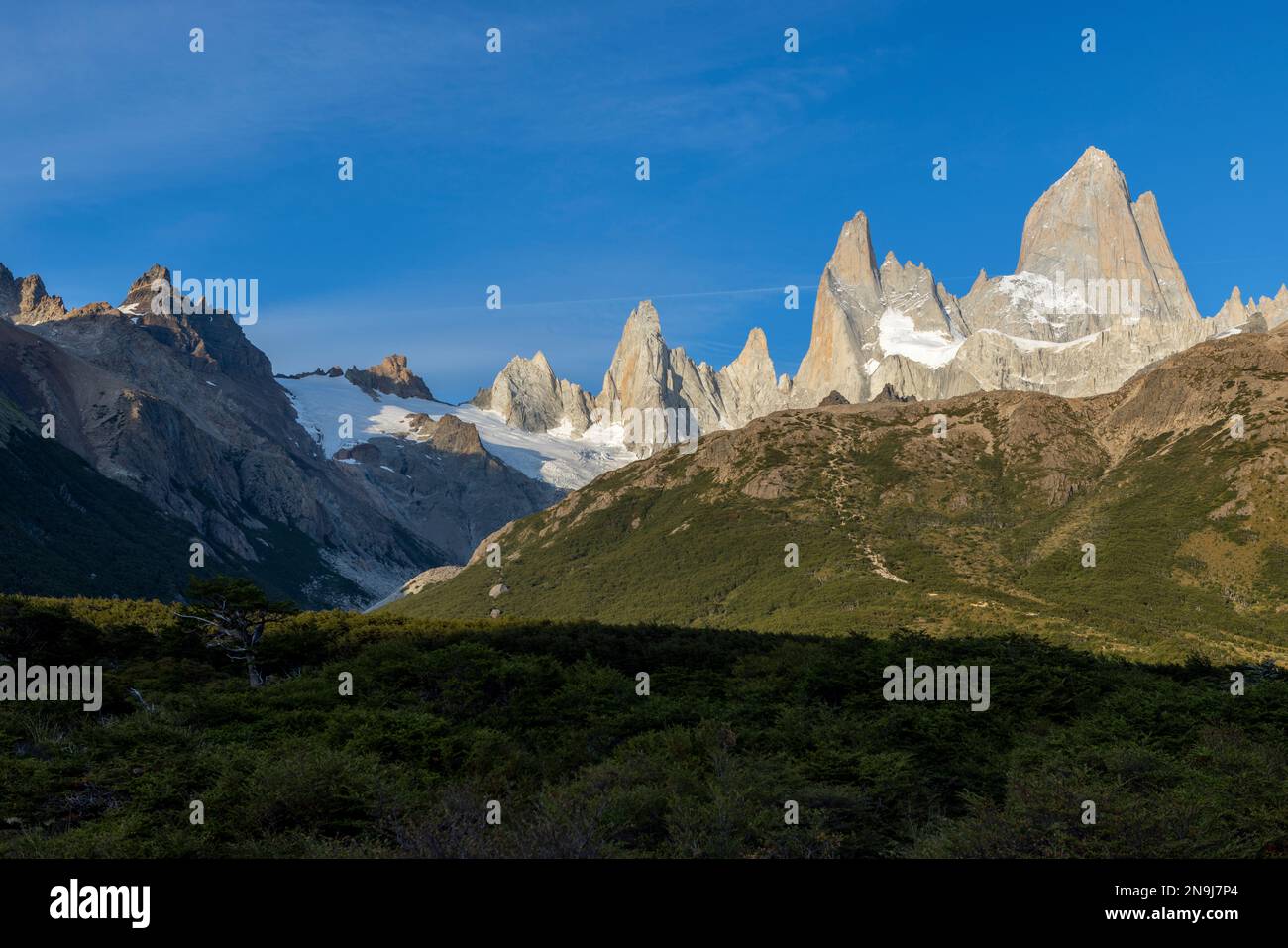 Picturesque mountain scenery in the first morning light while hiking to ...