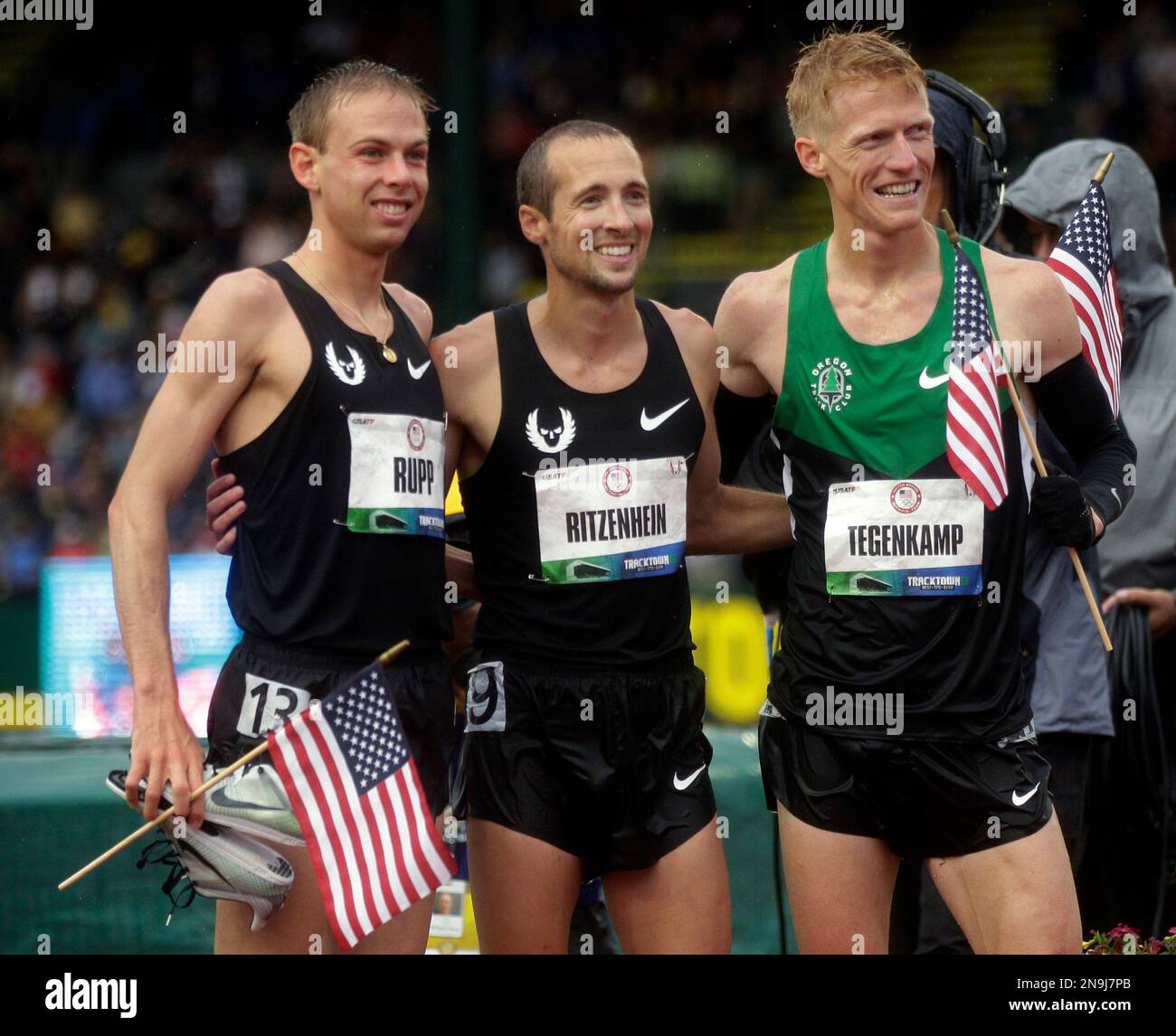 Galen Rupp, Matt Tegenkamp and Dathan Ritzenhein pose after the men's ...