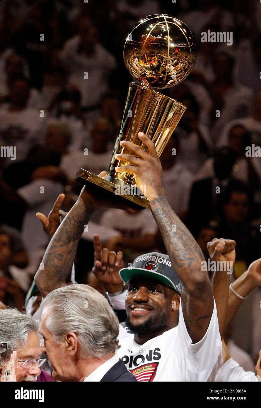 Miami Heat small forward LeBron James holds the Larry O'Brien NBA ...