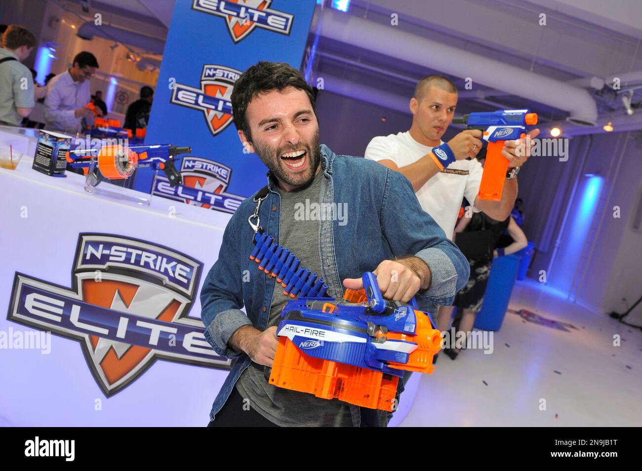 COMMERCIAL IMAGE - Guests try out the new Nerf N-Strike Elite Hail-Fire ...