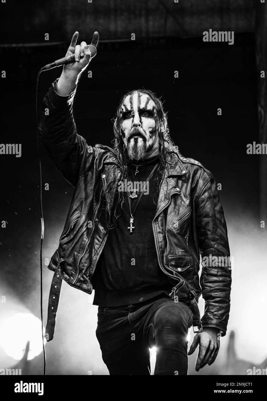 A vertical grayscale shot of Gaahl's Wyrd performing at the Brutal ...