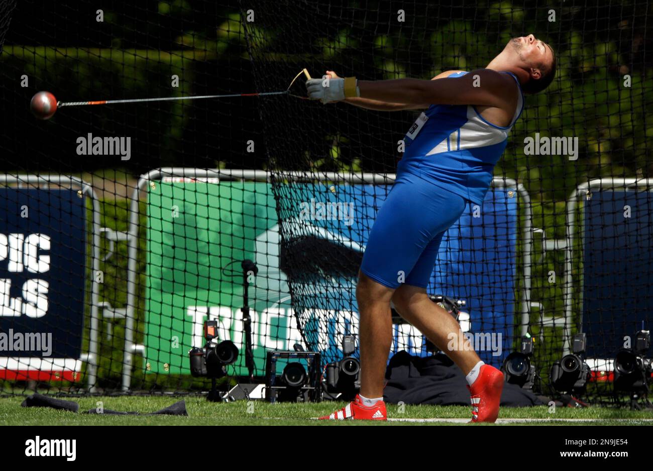 Alec Faldermeyer competes at the men's hammer throw qualifying round at ...