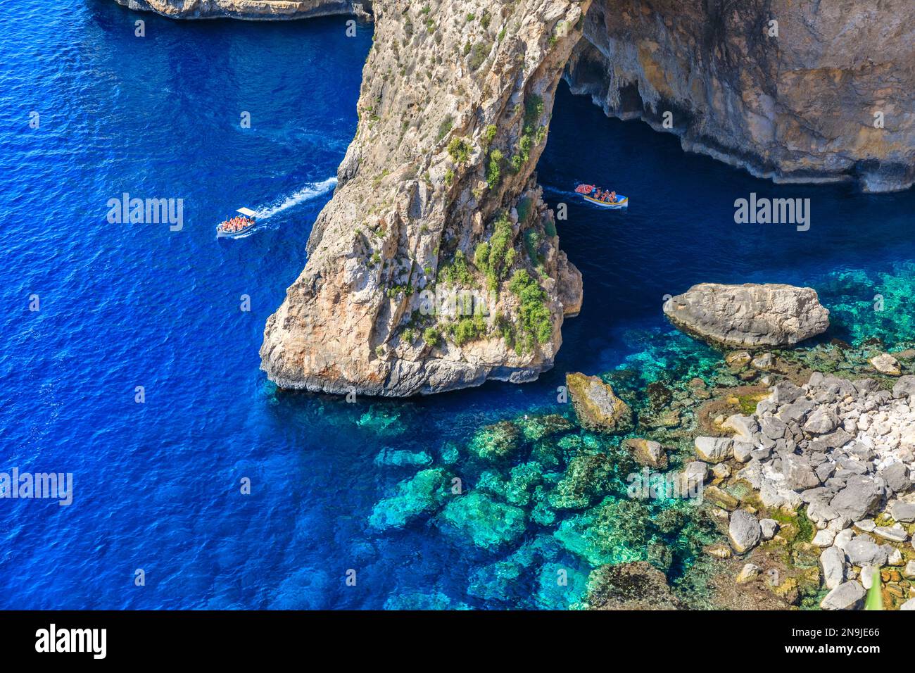 Blue Grotto in Malta. The sea cave is located near Wied iż-Żurrieq ...