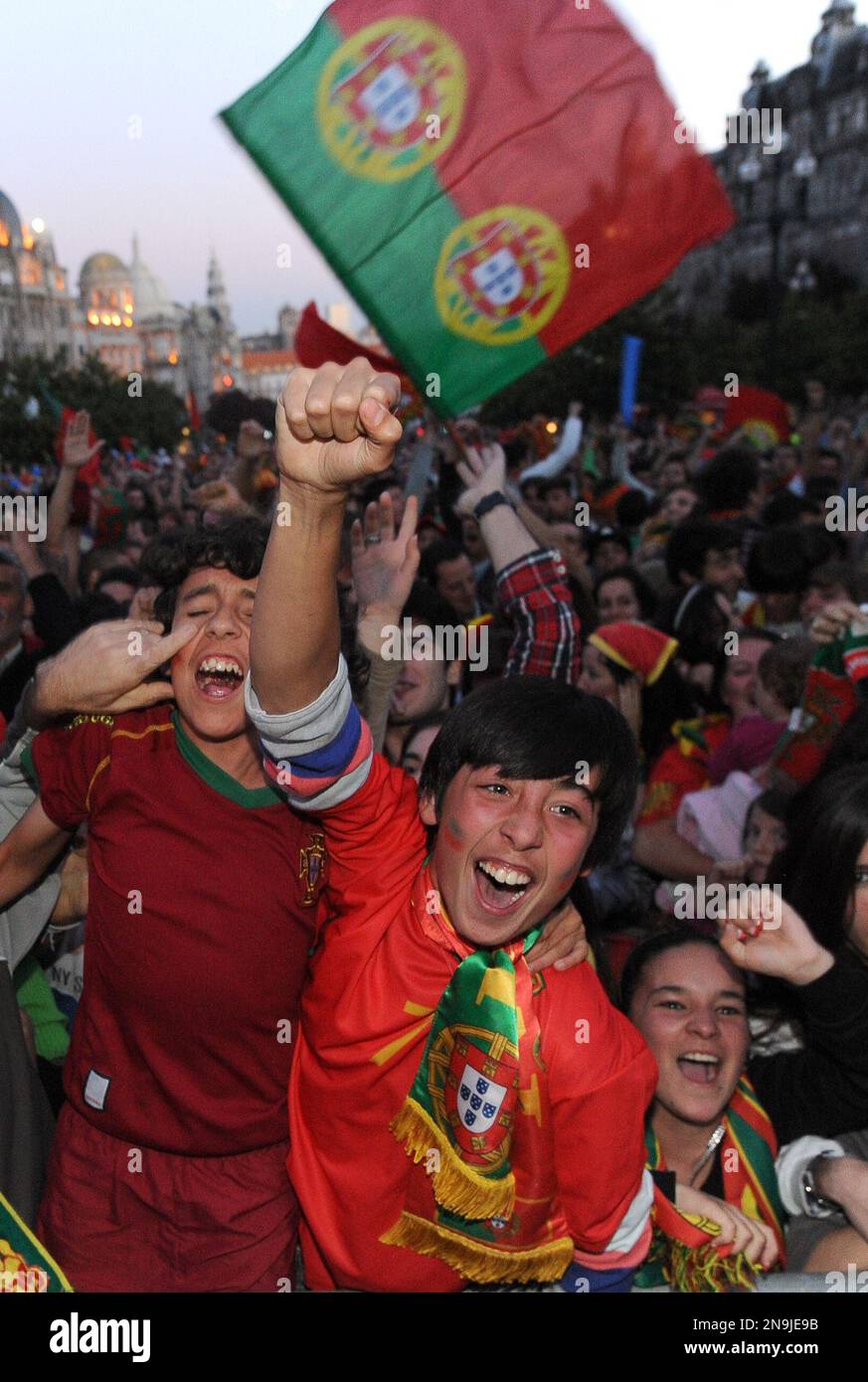 Portugal's soccer fans celebrate as they watch on a giantscreentheEuro ...