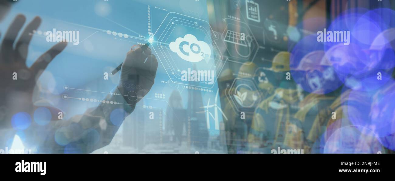 Engineer working virtual modern computer to reduce CO2 emissions carbon ...