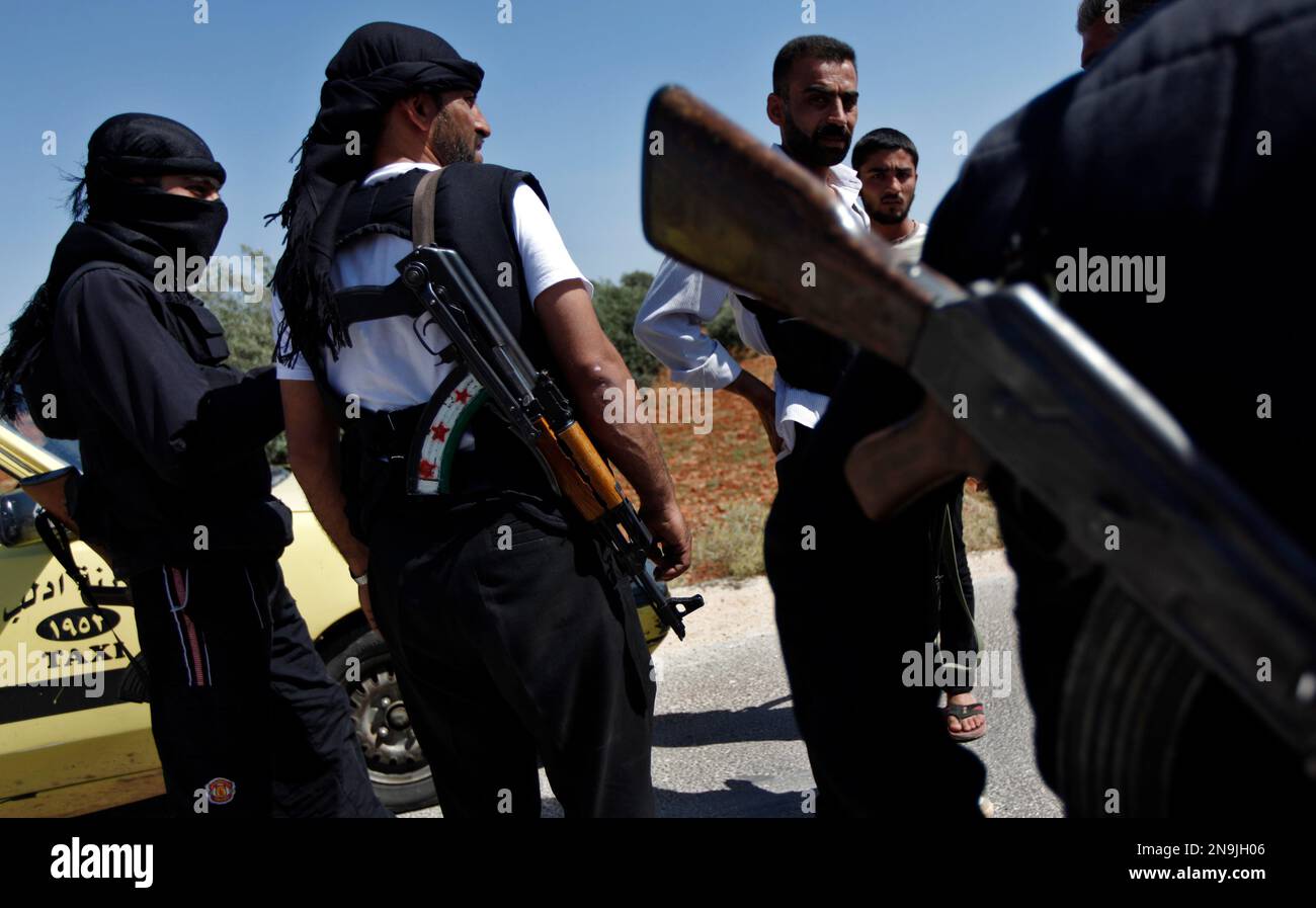 In this Sunday, June 3, 2012 photo, members of the Free Syrian Army ...