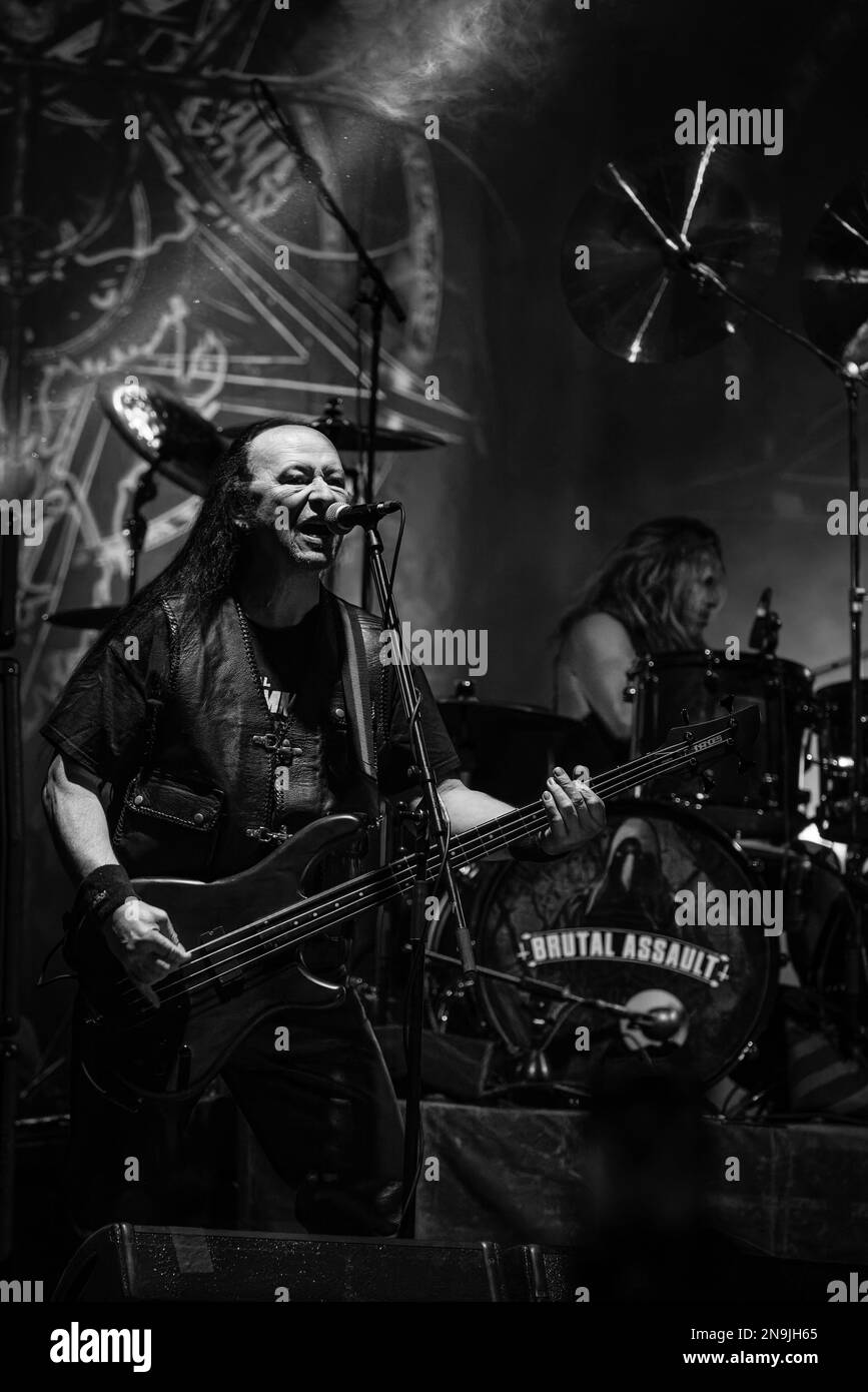 A vertical grayscale shot of Venom performing at the Brutal Assault ...