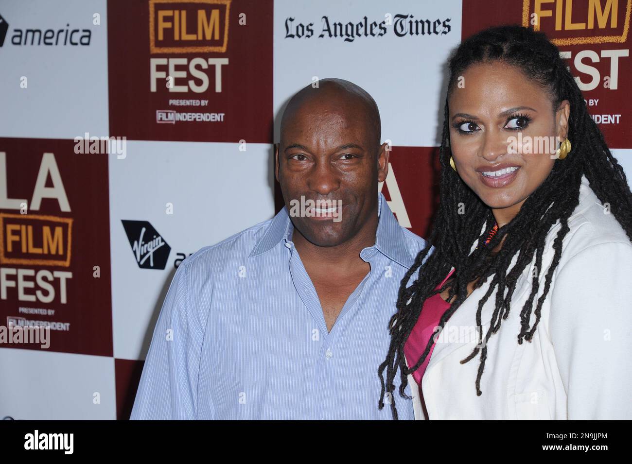 John Singleton, at left, and Ava DuVernay arrive at the L.A. gala ...