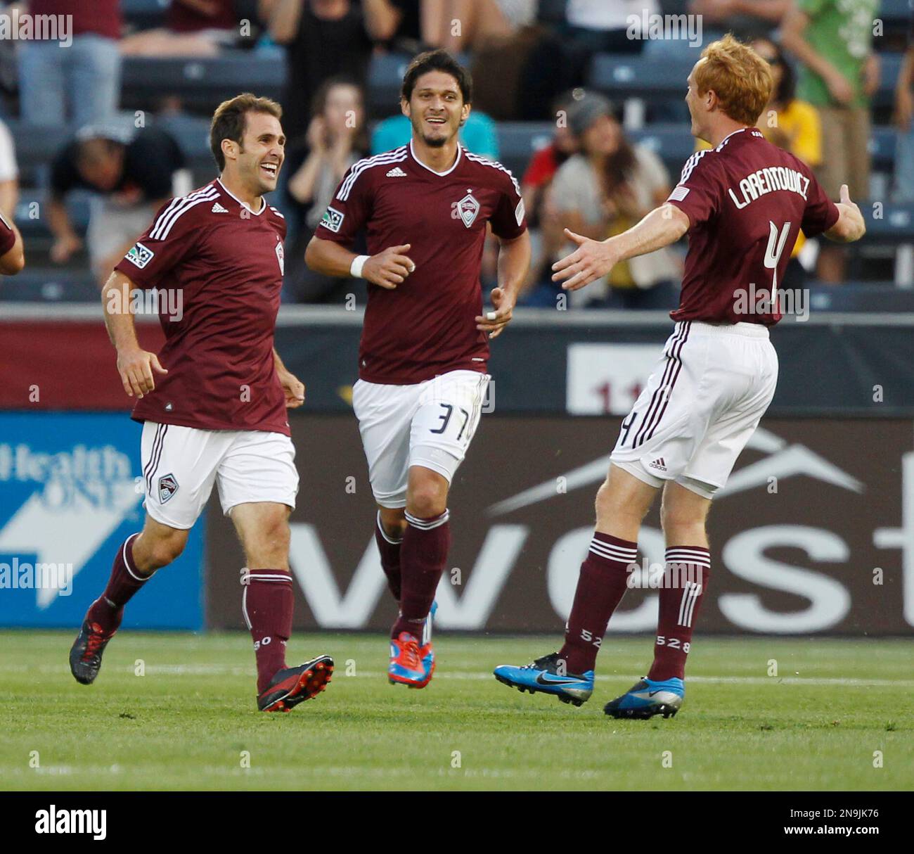 From left to right, Colorado Rapids midfielder Brian Mullan celebrates ...