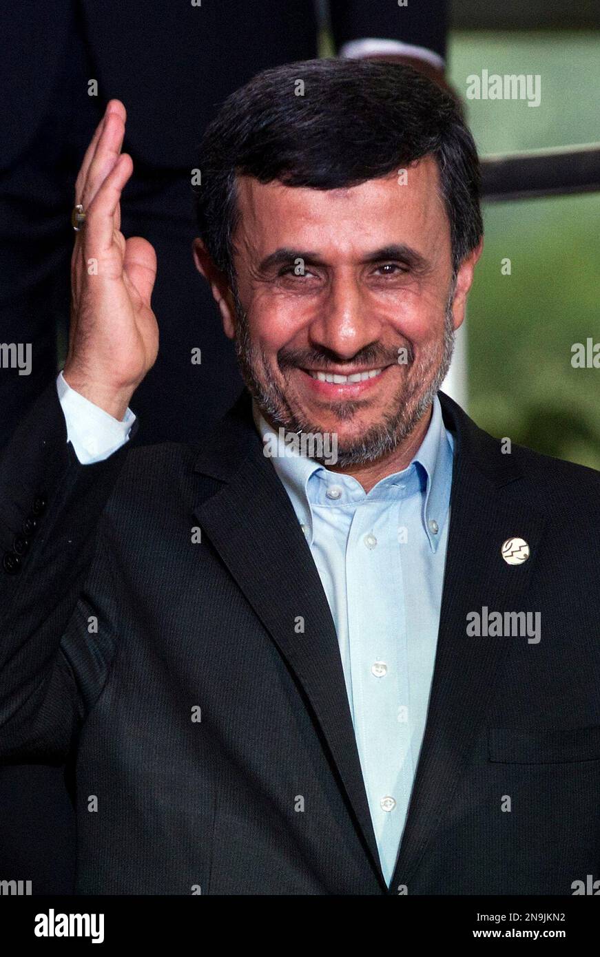 Iran President Mahmoud Ahmadinejad gestures as he poses for the group ...