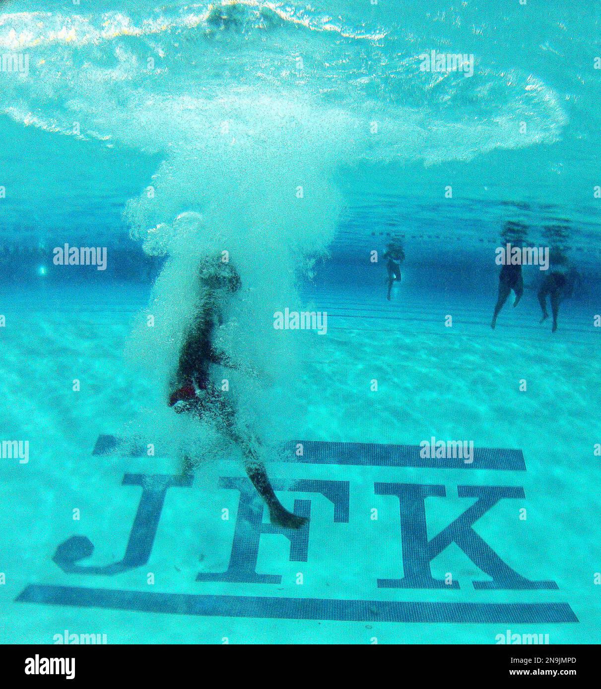 Talib Hopkins, 10, dives into a pool at the John F. Kennedy Aquatic ...